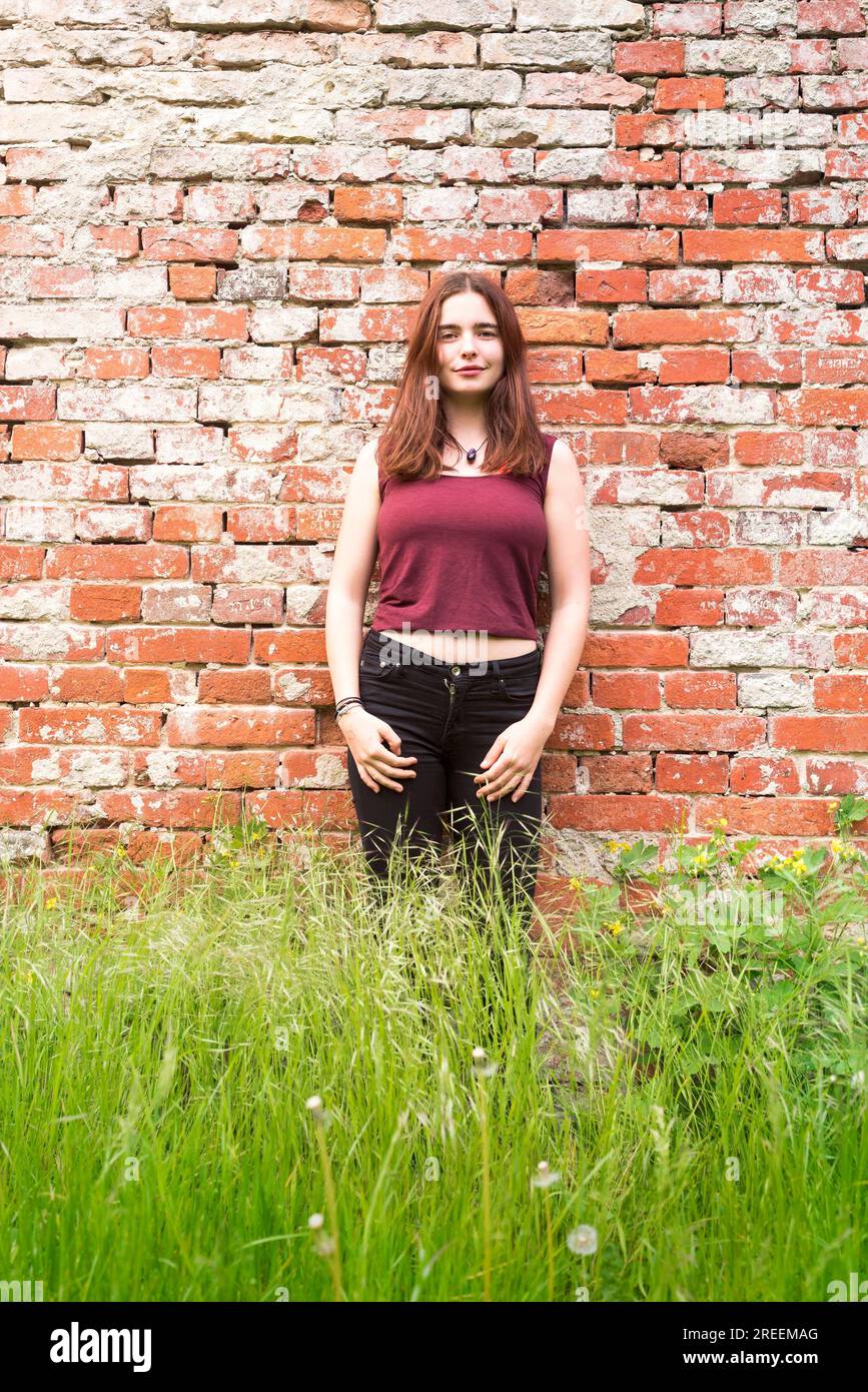 Red woman wall hi-res stock photography and images - Alamy