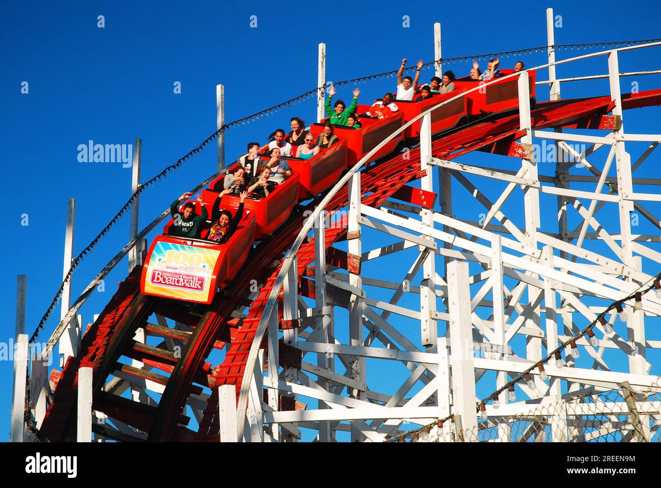 Thrill seekers come around on the drop of the Big Dipper Roller Coaster ...
