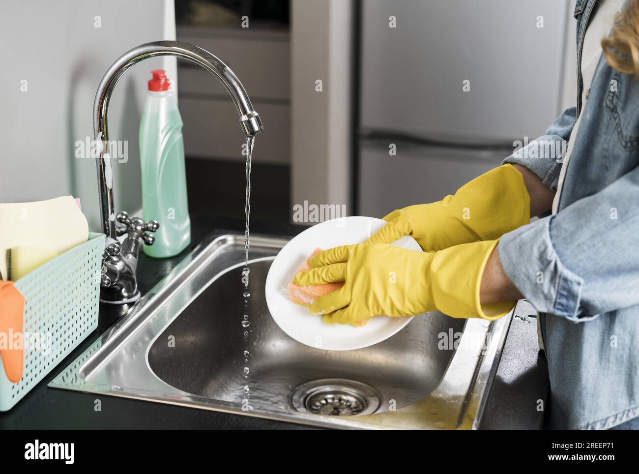Side view woman washing plate sink. Resolution and high quality ...