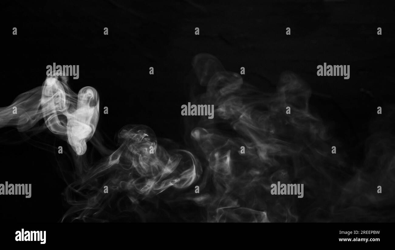 Swirl white smoke against black dark background. Resolution and high ...