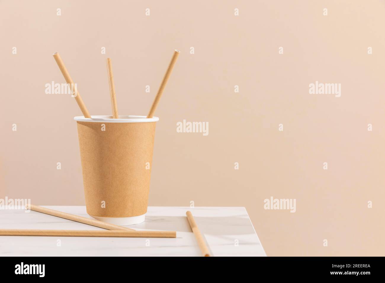 Paper cup straws arrangement Stock Photo - Alamy