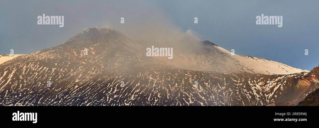 Snow-capped peaks, trees, wall of lava rubble, Etna, volcano, eastern ...