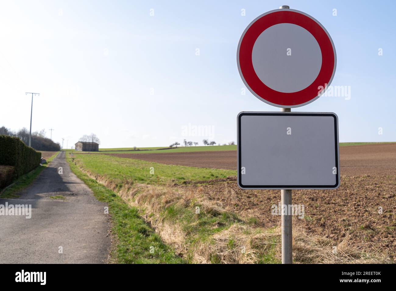 Round road sign with space for text in the farmland Stock Photo - Alamy