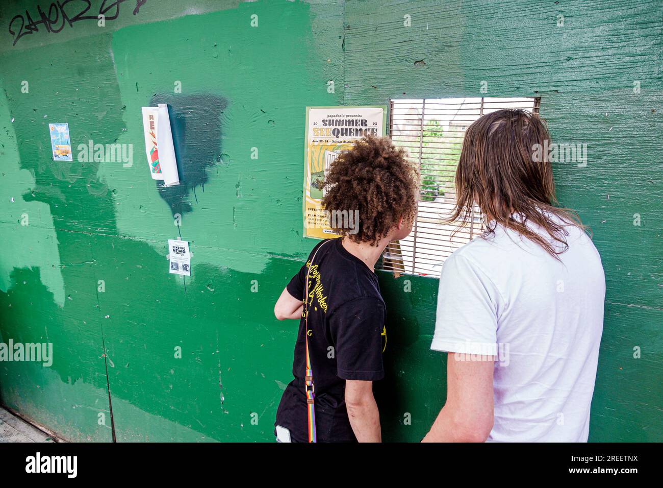 Asheville North Carolina,woman man couple,looking through under new ...