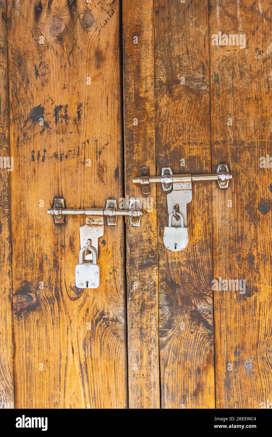Berna Bugh, Kangan, Jammu and Kashmir, India. Padlocks on a weathered ...