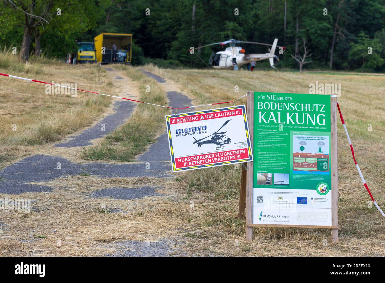 Signs for soil protection liming at a cordoned-off helicopter landing ...