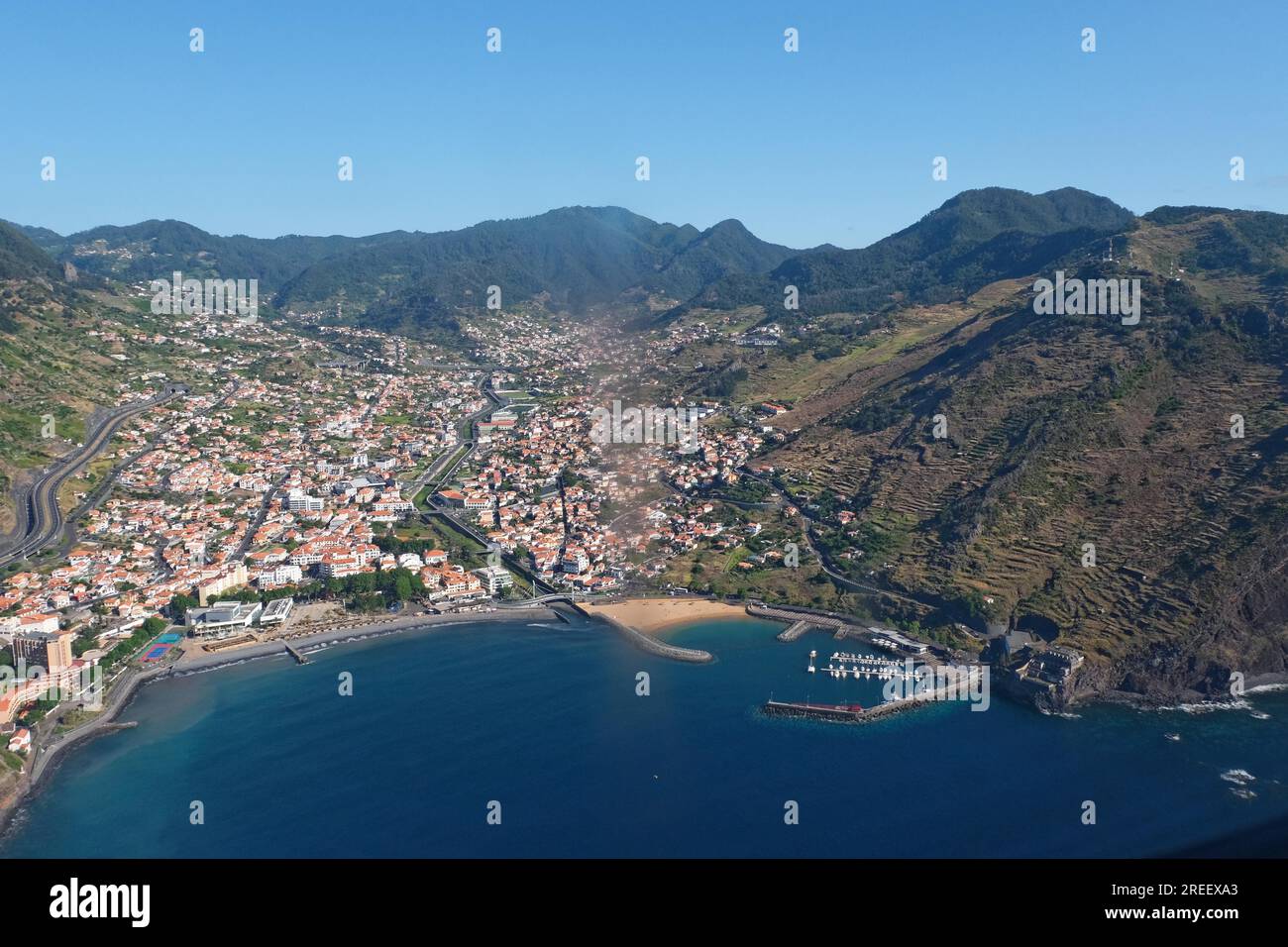 Aerial view from aeroplane, place Machico, harbour, Atlantic Ocean ...
