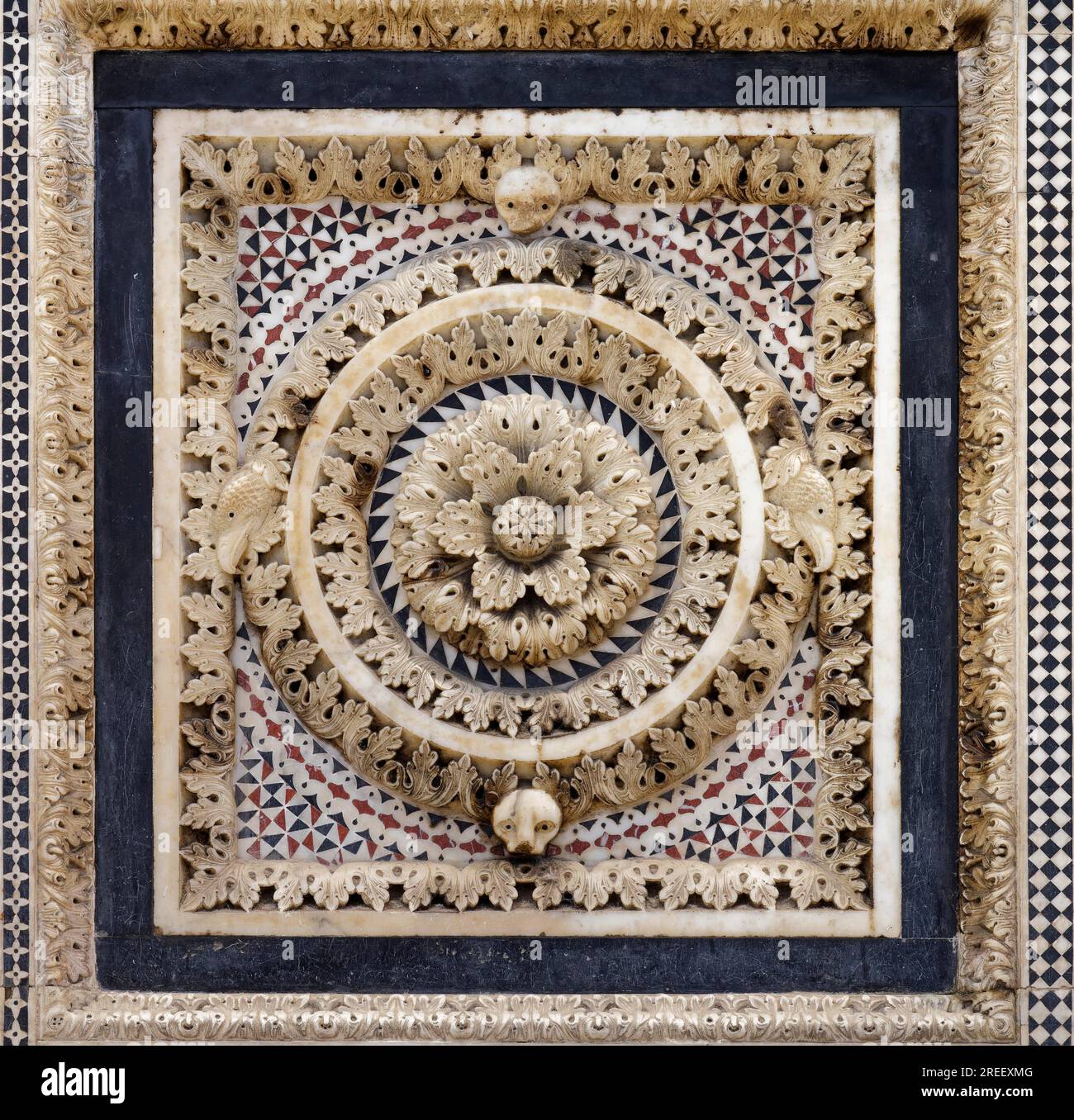 Decorative rose with animal heads, marble, detail baptismal fountain ...