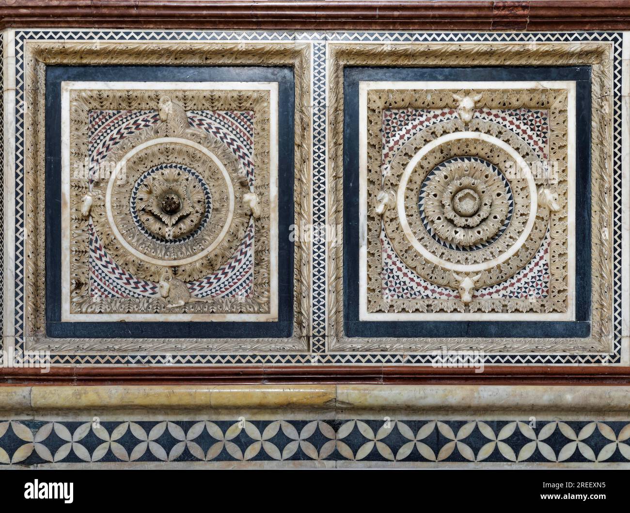 Decorative roses with animal heads, marble, detail baptismal fountain ...