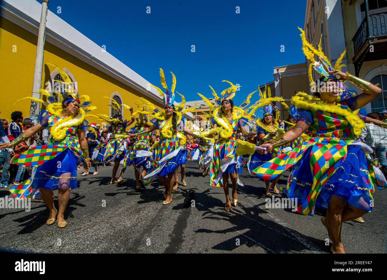 Colourful costumed, pretty women are dancing. Carnival. Mindelo. Cabo ...