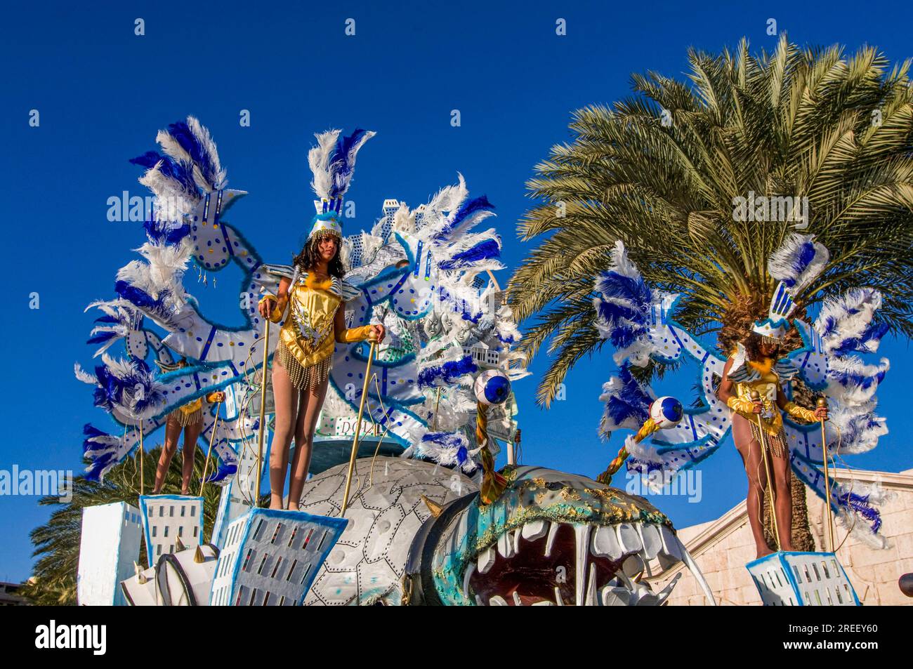 Colourful costumed, pretty women are dancing. Carnival. Mindelo. Cabo ...