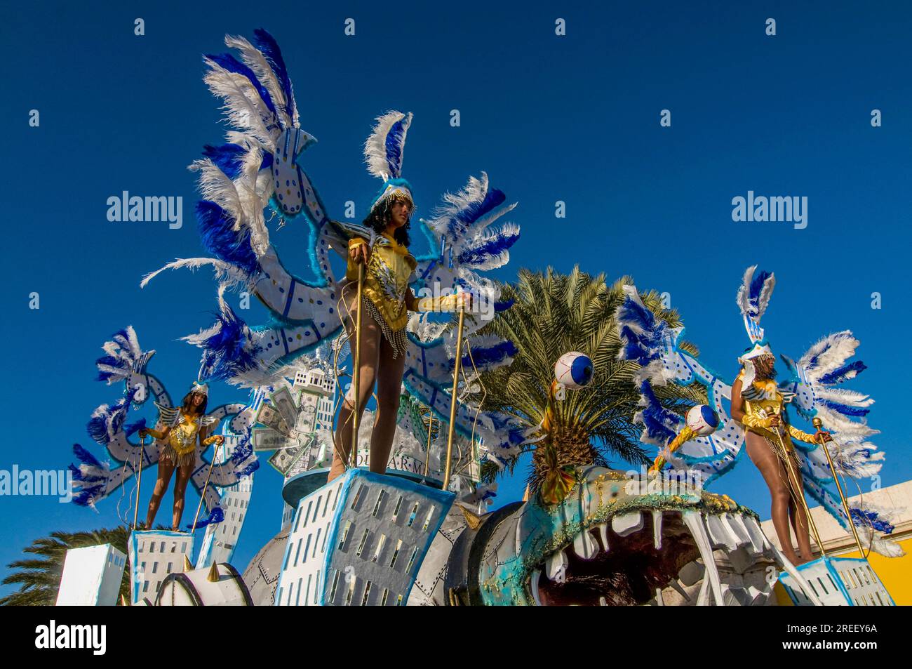Colourful costumed, pretty women are dancing. Carnival. Mindelo. Cabo ...