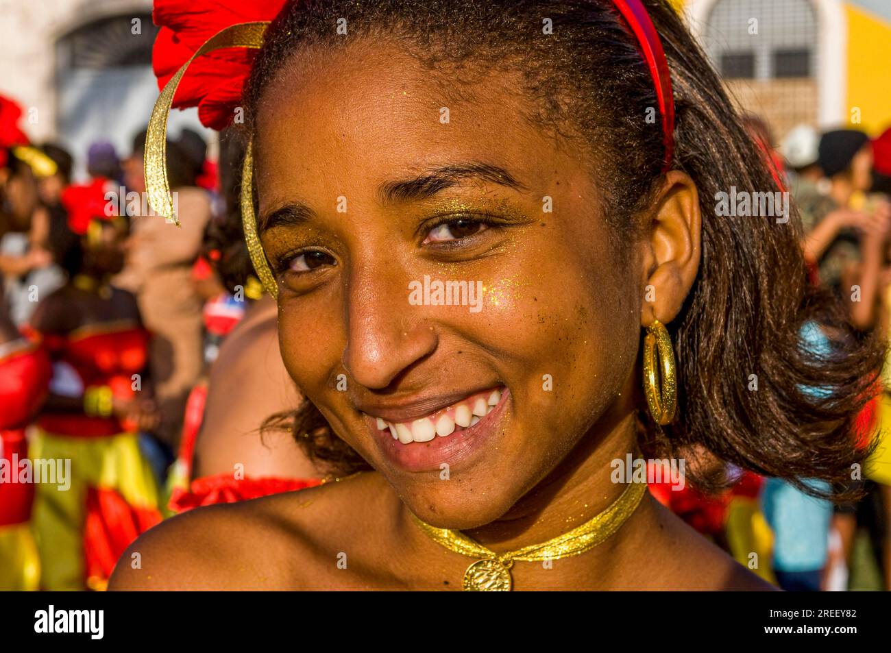 Portrait of colourful costumed, pretty woman. Carnival. Mindelo. Cabo ...