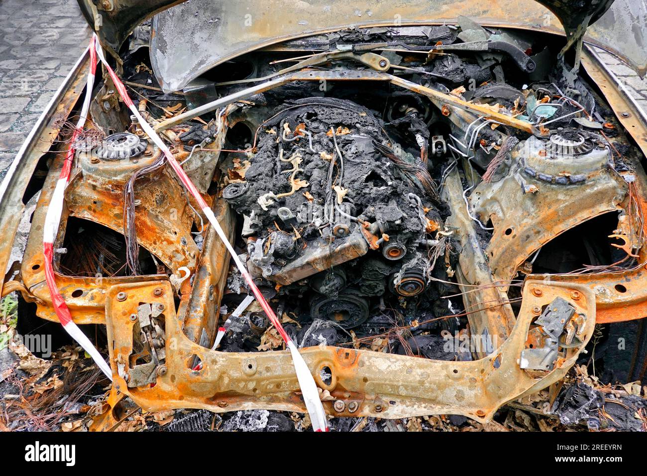 Destroyed and burnt engine, arson attack on a car, Berlin, Germany ...
