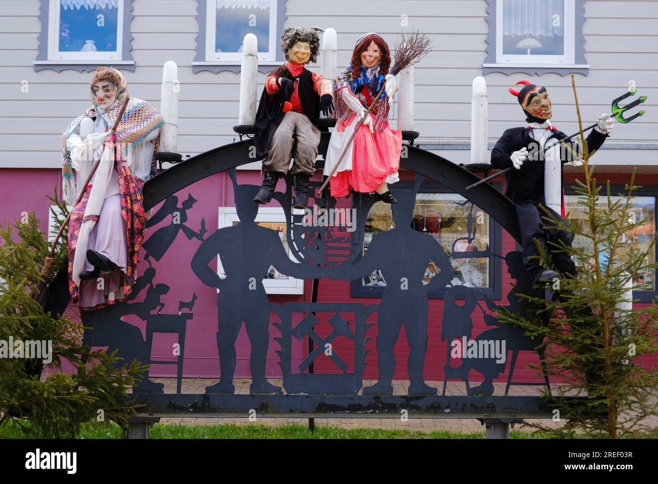 Figures of witches in front of a residential house, Walpurgis Night, St ...