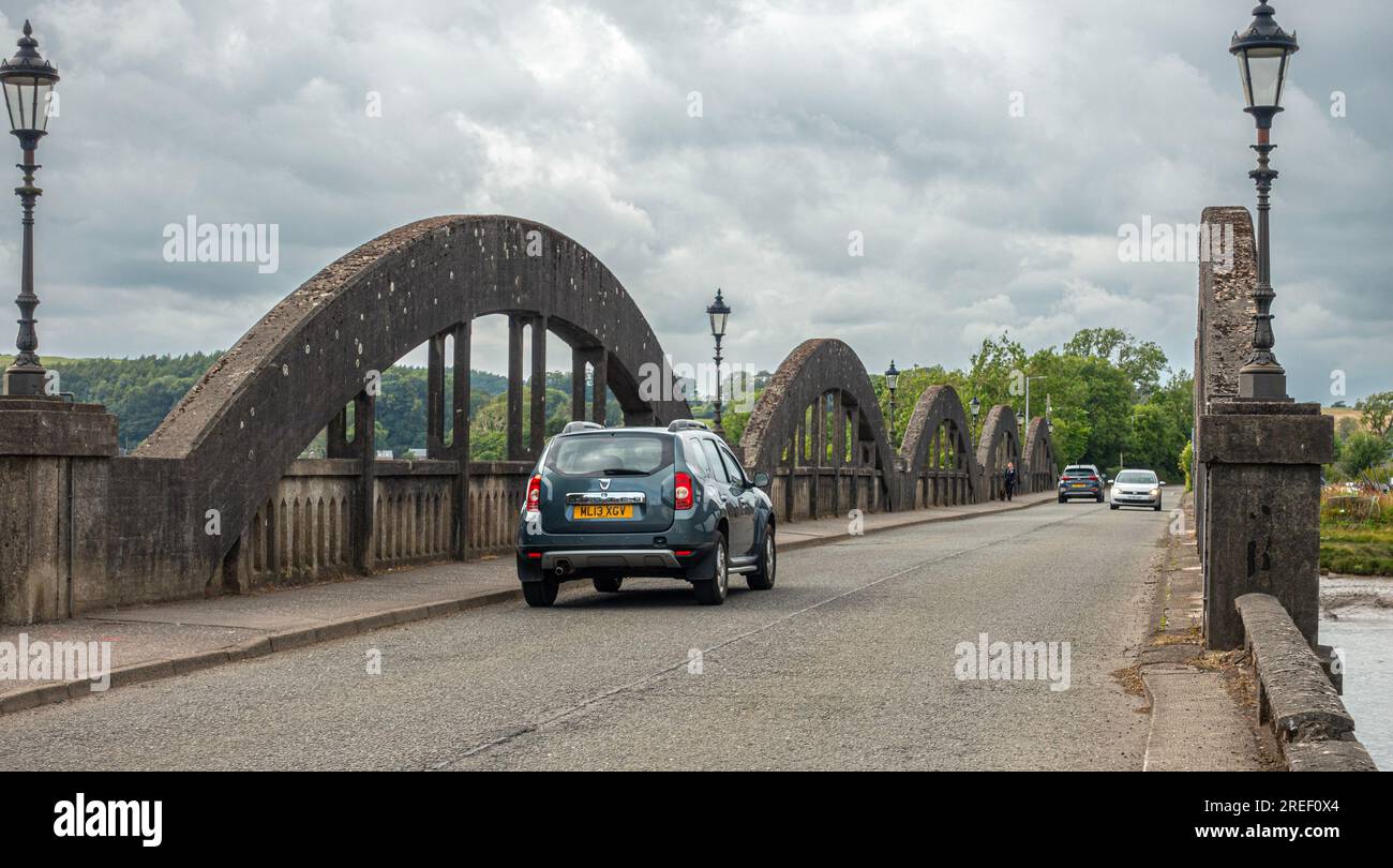 Cars and a dog-walker crossing Kirkudbright Bridge (1926), a 5-span ...