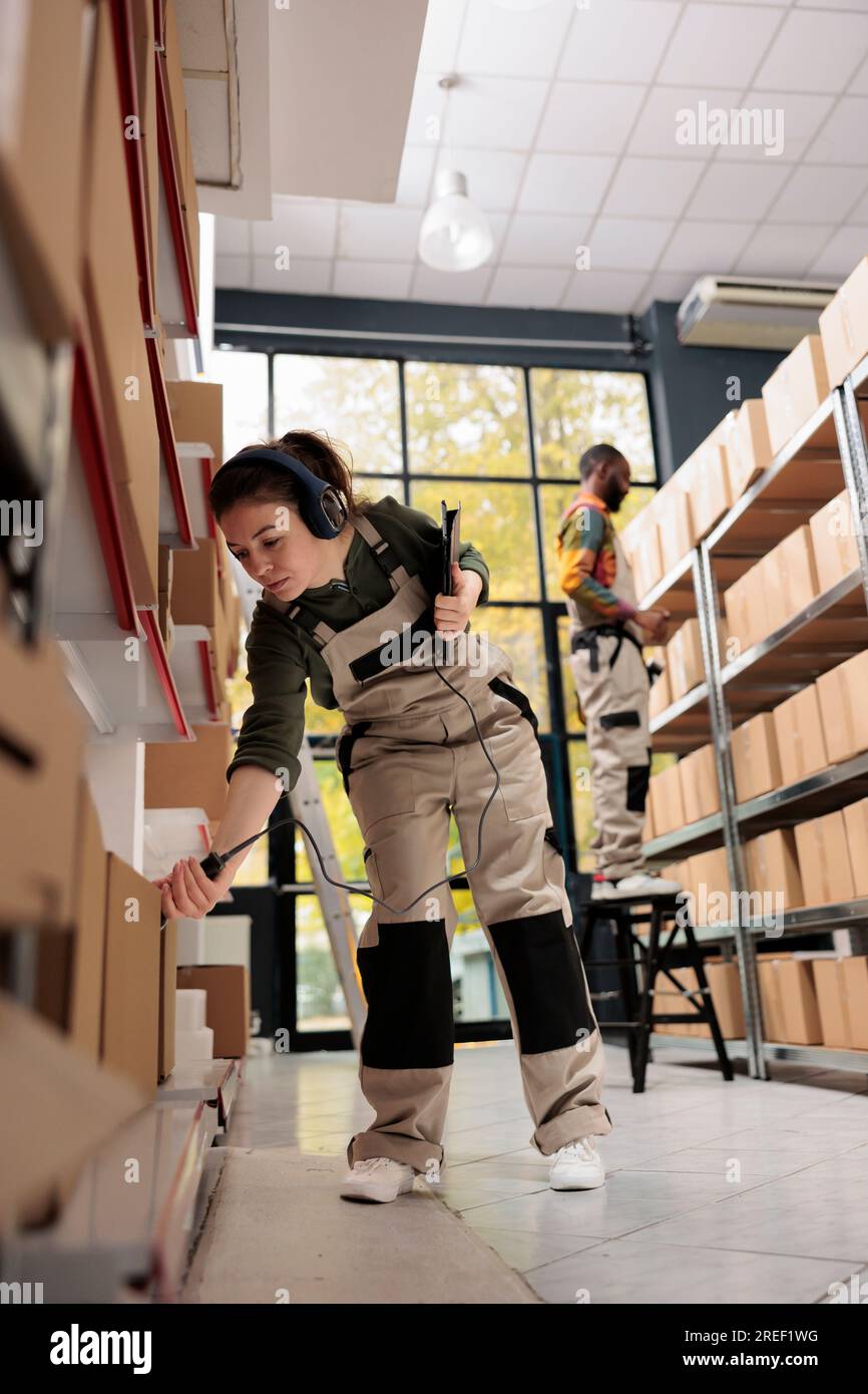 Warehouse employee during inspection hi-res stock photography and ...