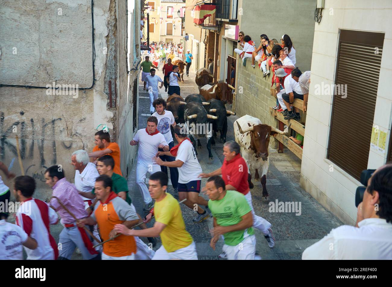 A thrilling photo capturing the excitement as people run ahead of the ...