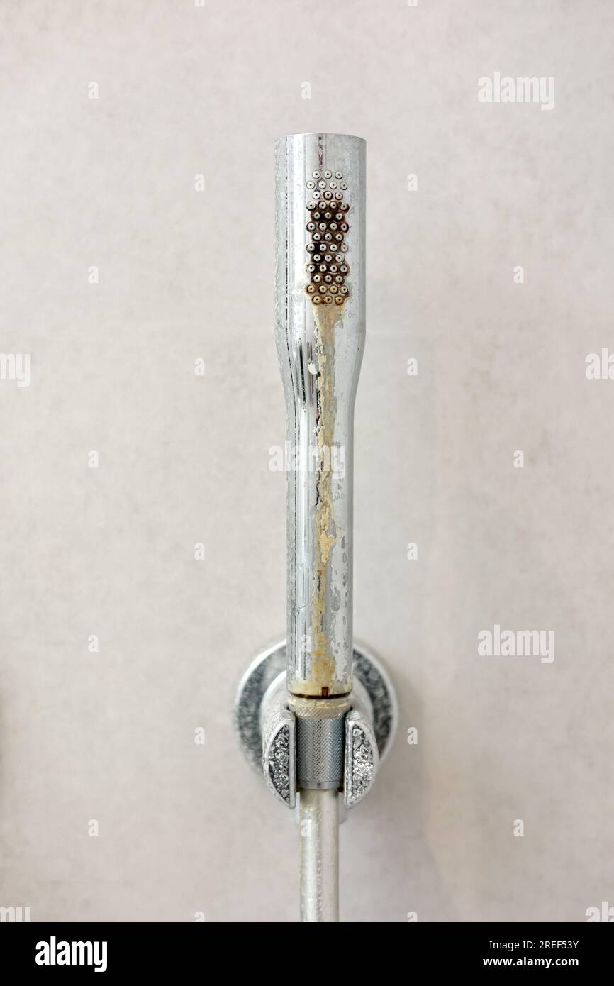 Dirty calcified shower chrome mixer tap, faucet with limescale on it ...