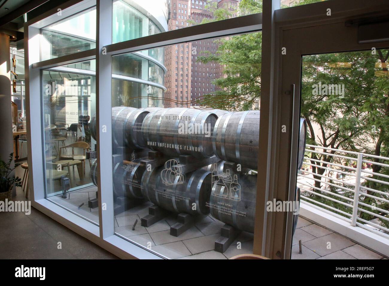 Barrels sit on an outside terrace of the 4th floor Arriviamo Cocktail ...