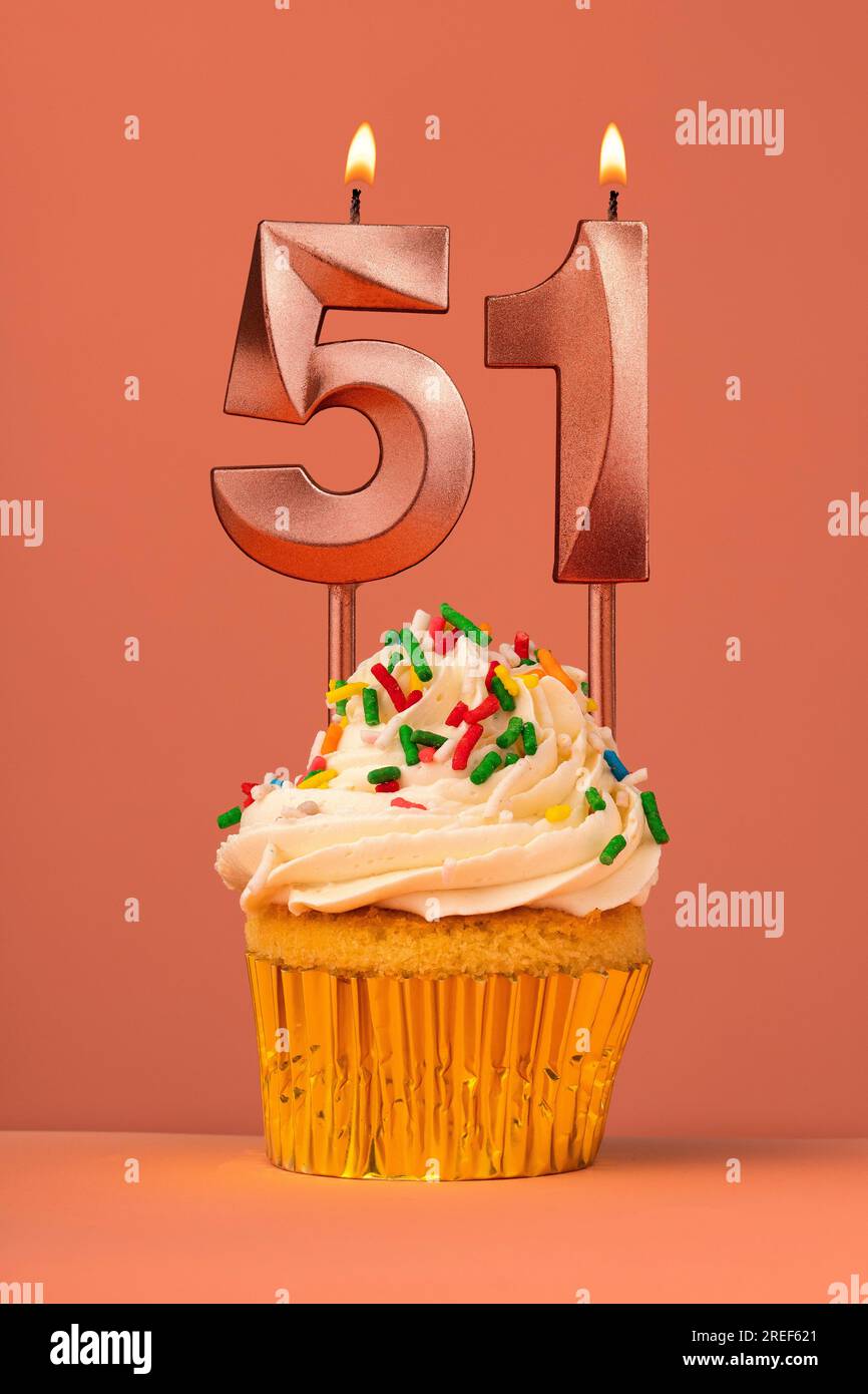 Birthday cake with candle number 51 - Coral fusion background Stock ...