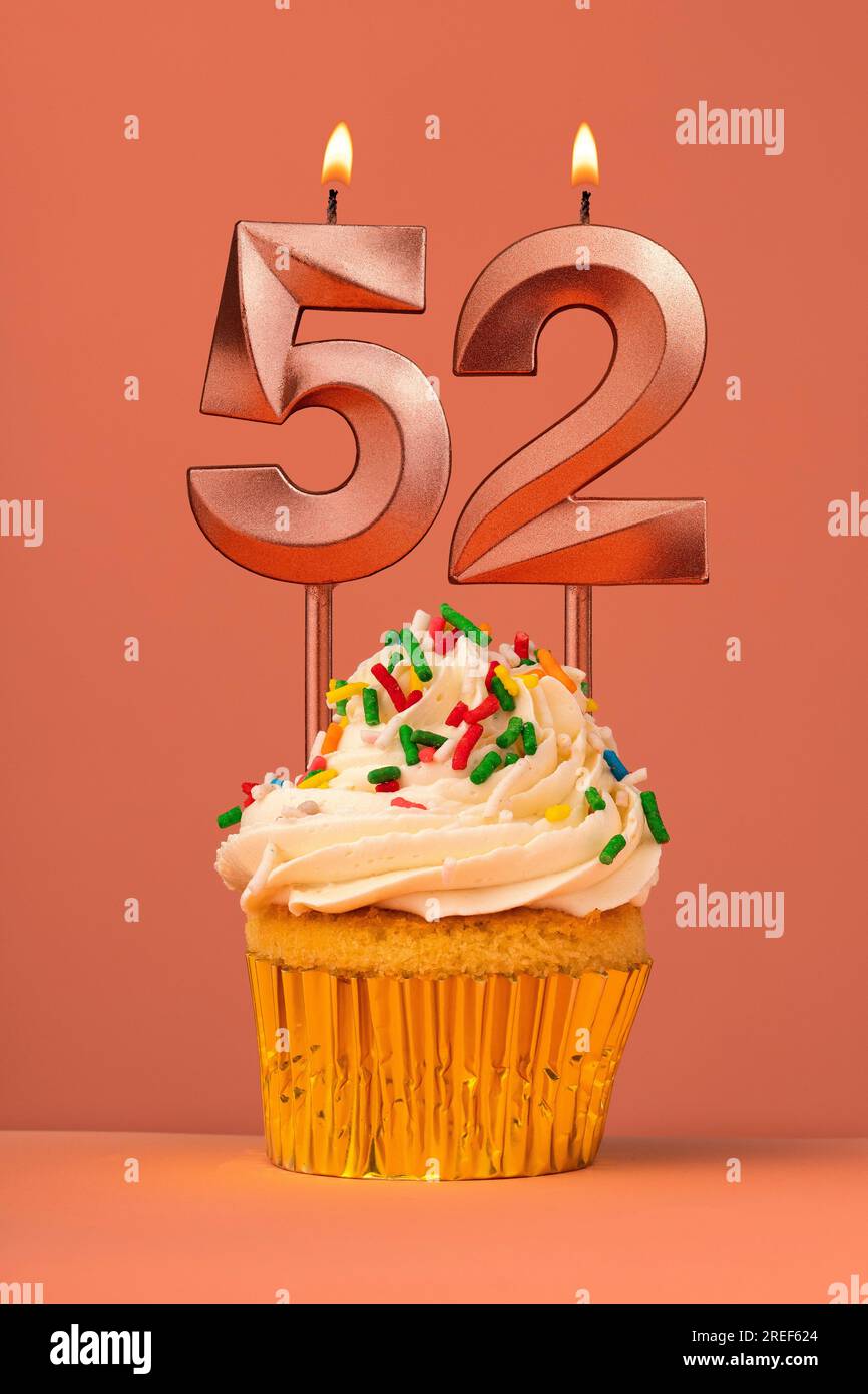 Candle number 52 - Cake birthday in coral fusion background Stock Photo ...