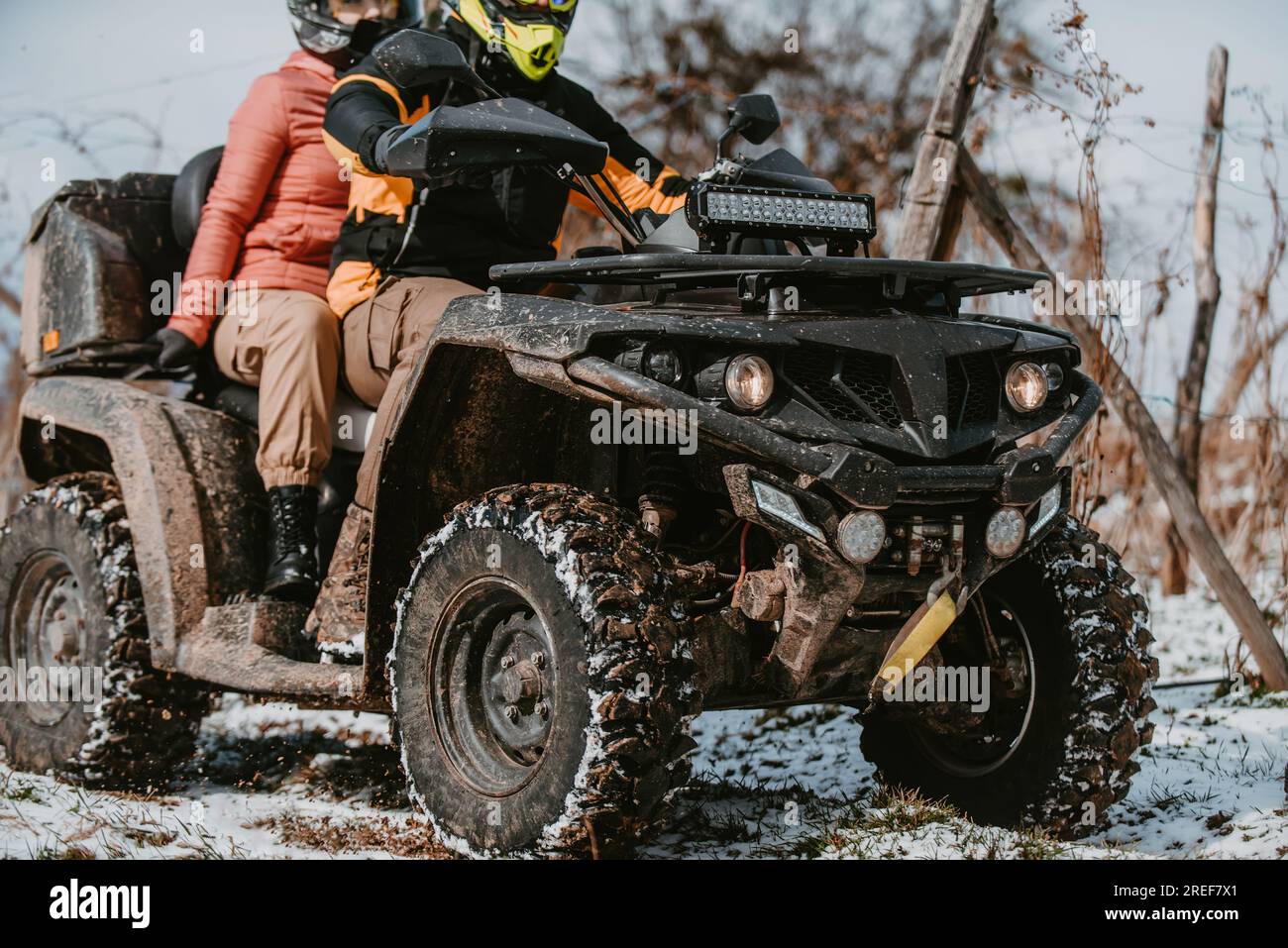 A young adventurous couple embraces the joy of love and thrill as they ...
