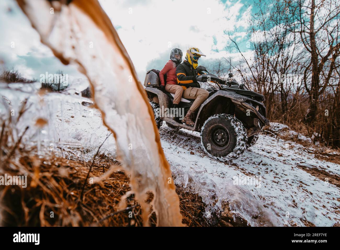A young adventurous couple embraces the joy of love and thrill as they ...