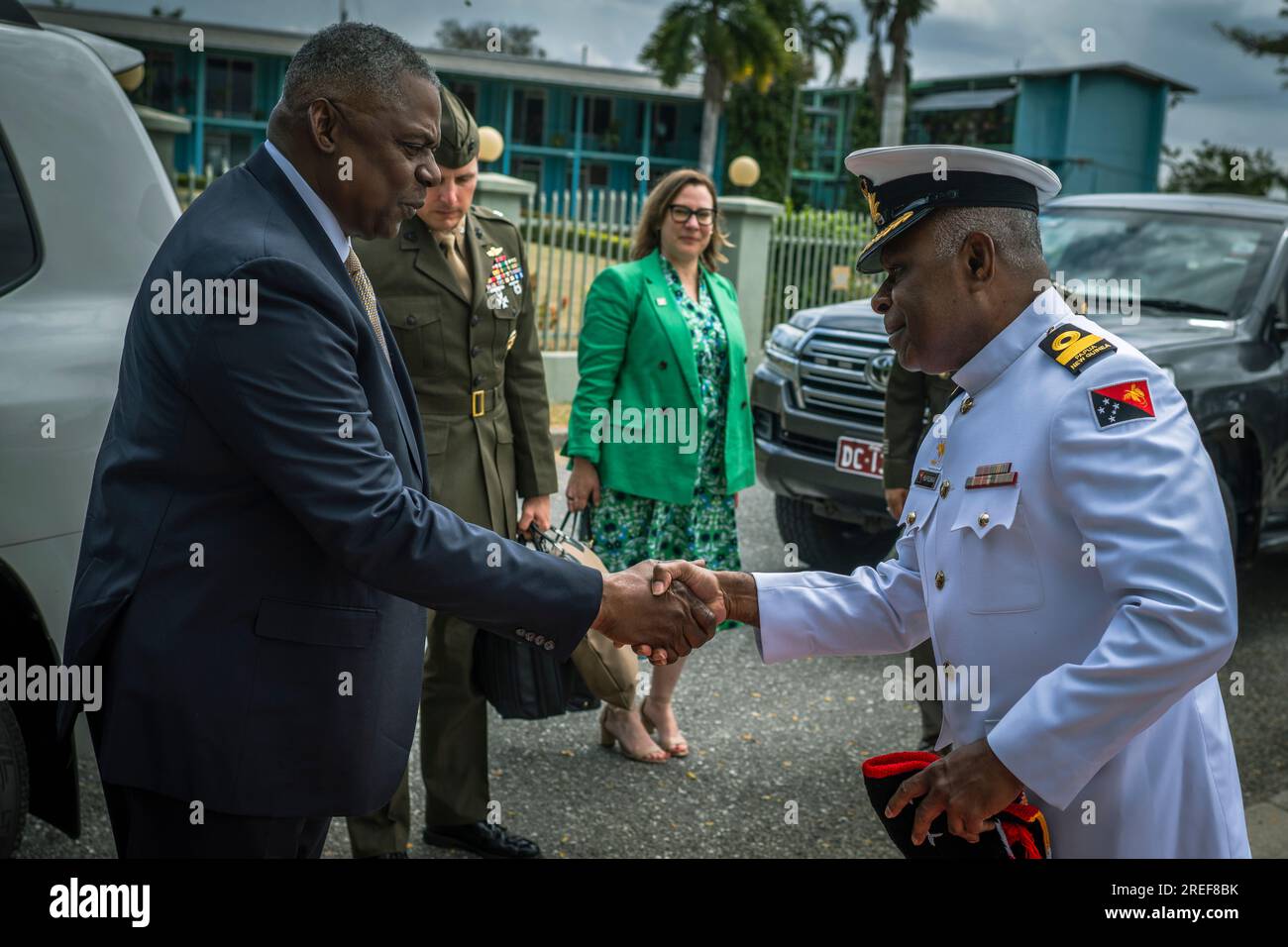 Secretary of Defense Lloyd J. Austin III greets Commodore Philip ...