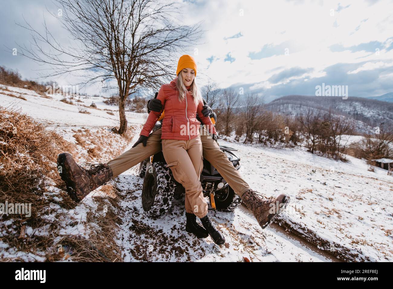 A young adventurous couple embraces the joy of love and thrill as they ...