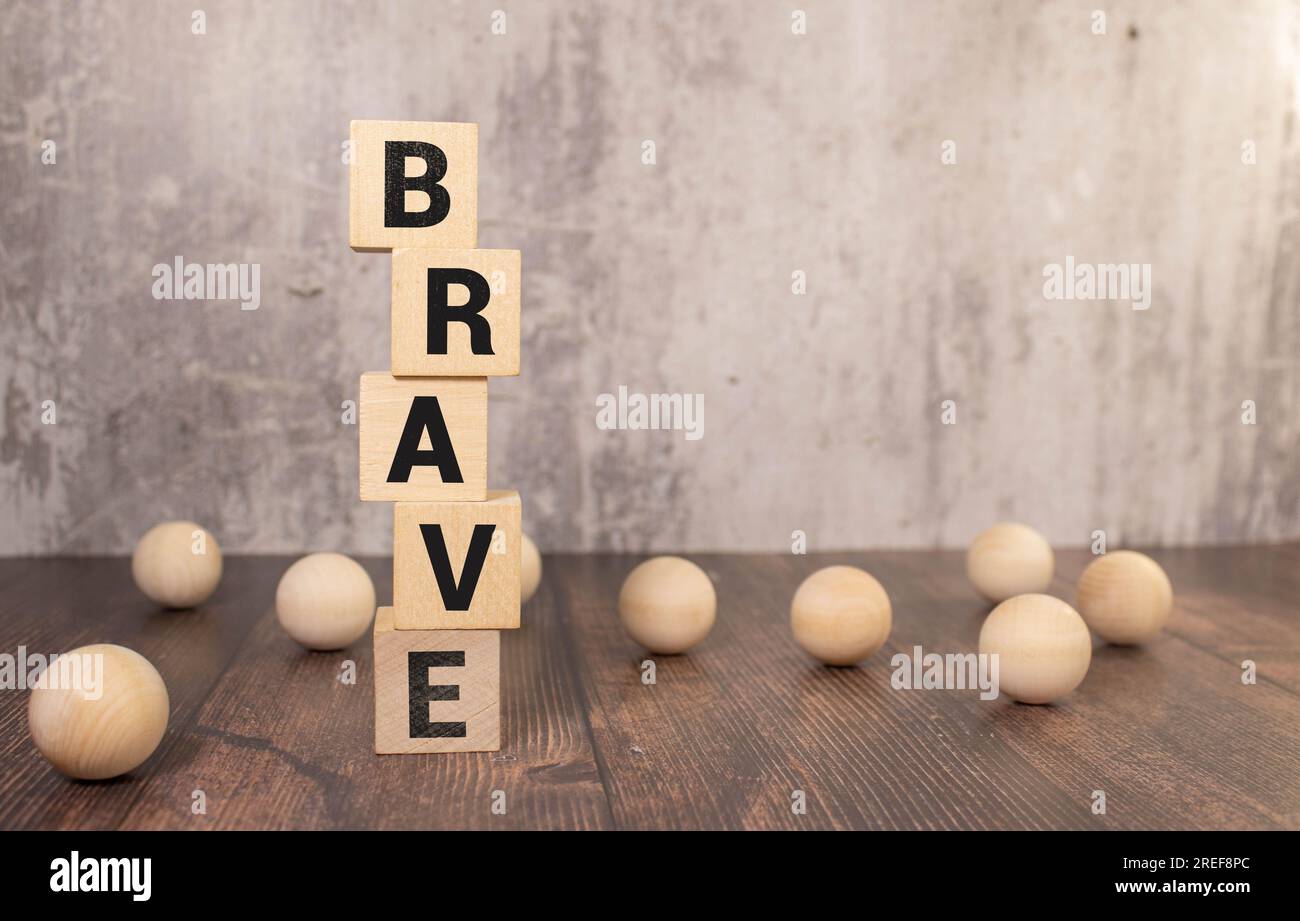 Brave word with black background Stock Photo - Alamy