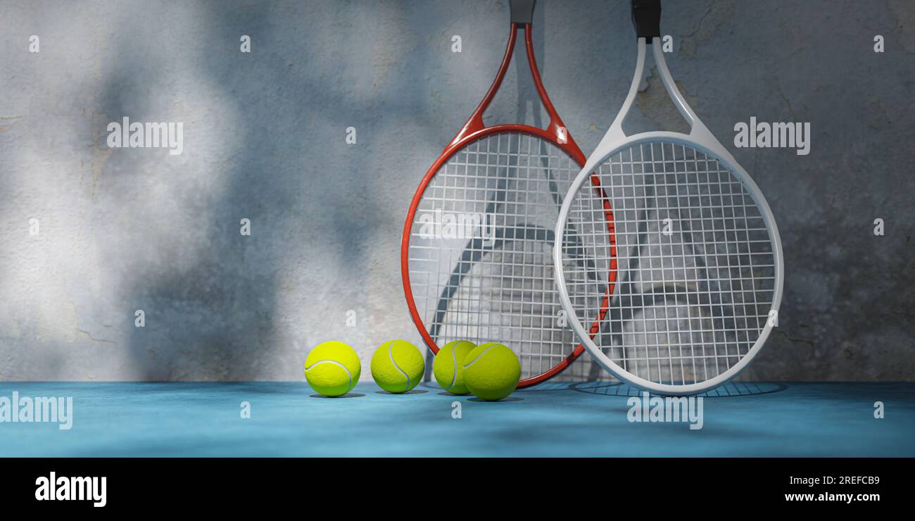 Two tennis rackets and balls upright during a break in a tennis match ...
