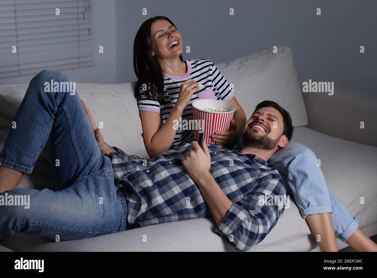 Woman man happy home comedy hi-res stock photography and images - Alamy
