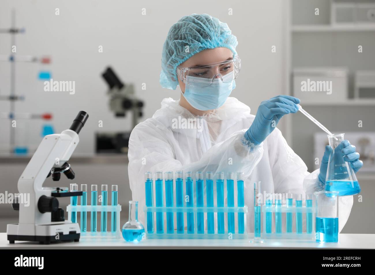 Chemical liquid dripping doctor scientist hi-res stock photography and ...