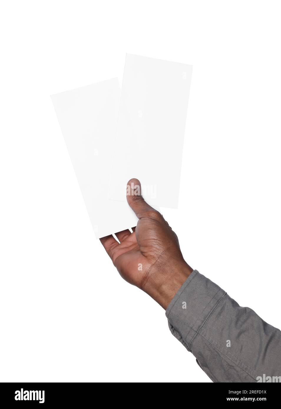 African American man holding flyers on white background, closeup ...