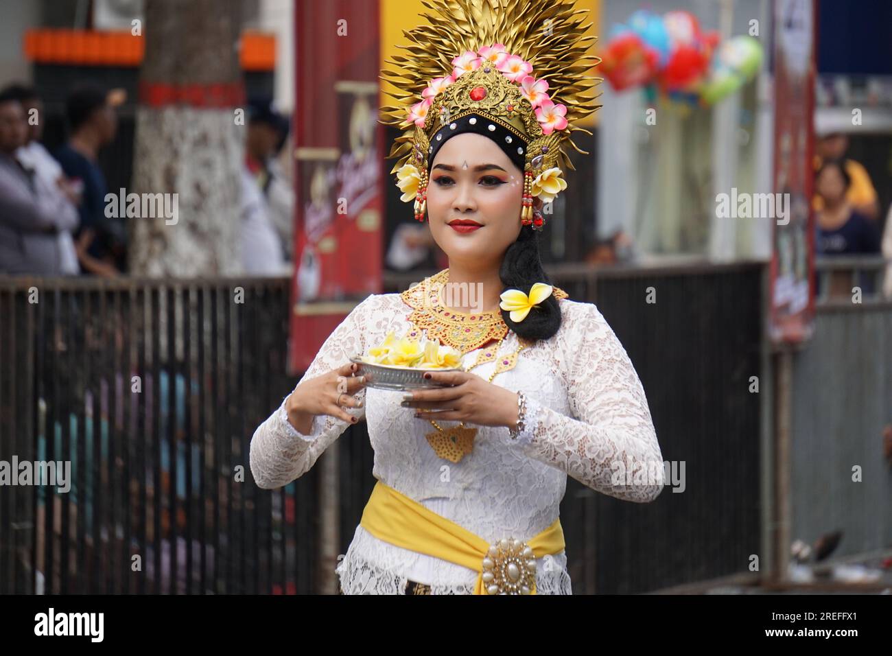 A beautiful woman with a traditional cloth from Bali at BEN Carnival ...