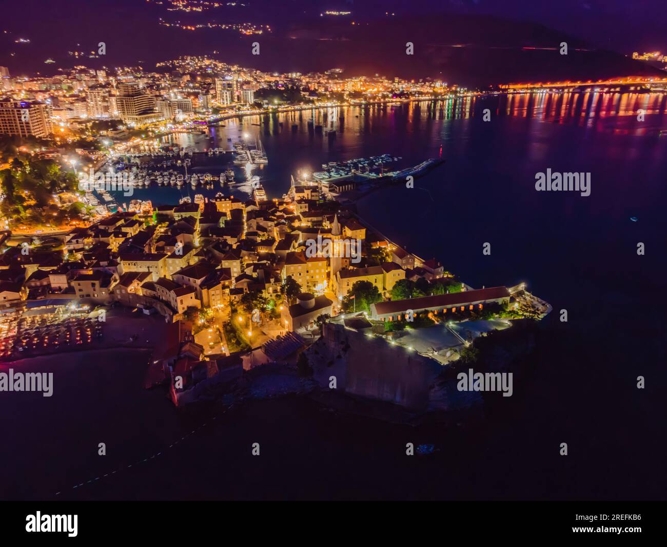 Budva city lights from Montenegro seen from above. Night view. Drone ...