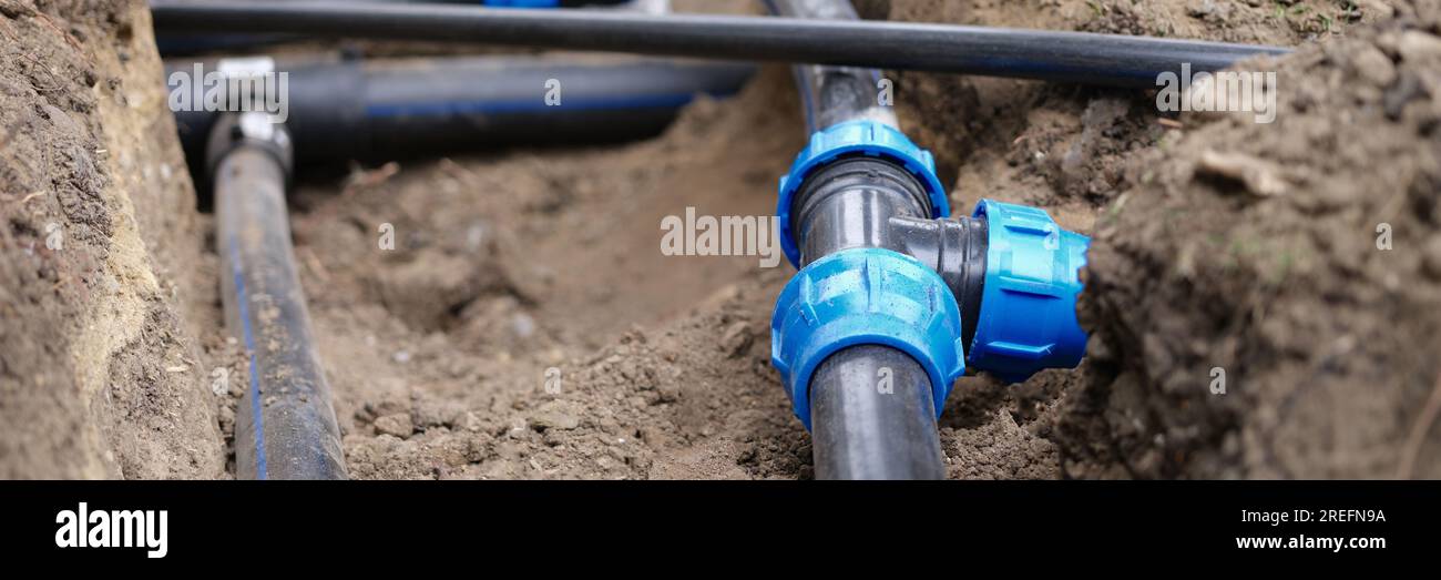 Installation of pipeline irrigation system outdoor Stock Photo - Alamy