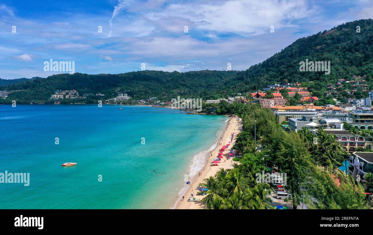 Aerial view of sea front hotels and apartments and tourists enjoying ...