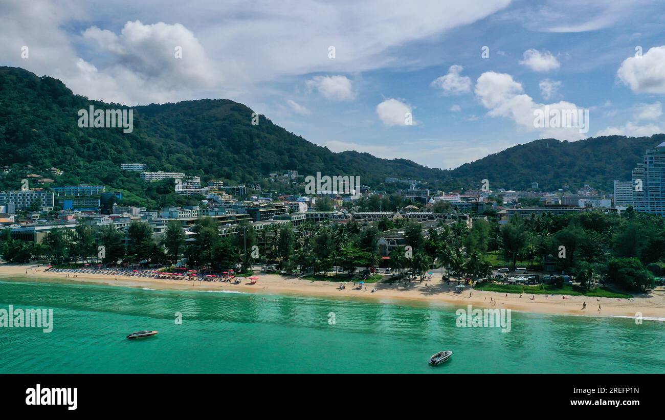 Aerial view of sea front hotels and apartments and tourists enjoying ...