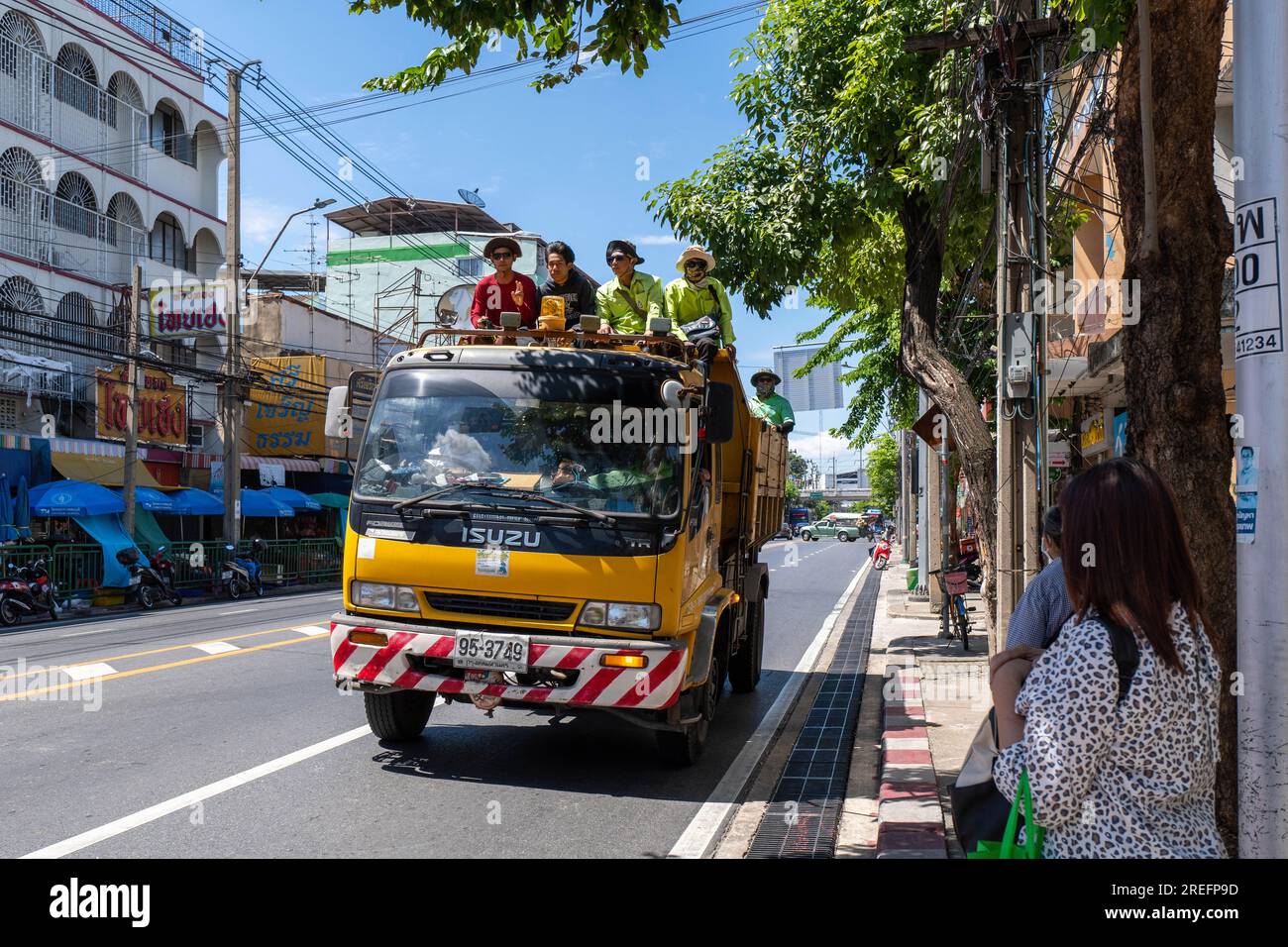 Bangkok, Thailand. 27th July, 2023. Thai Garbage collectors in the back ...