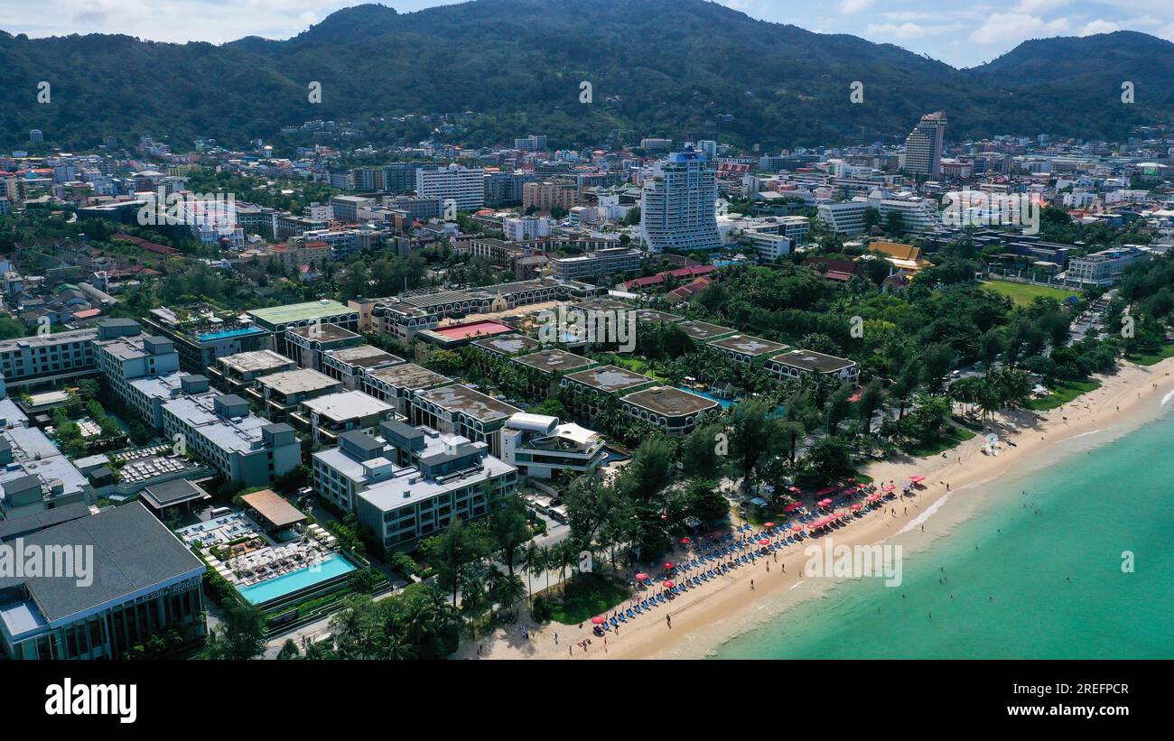 Aerial view of sea front hotels and apartments and tourists enjoying ...