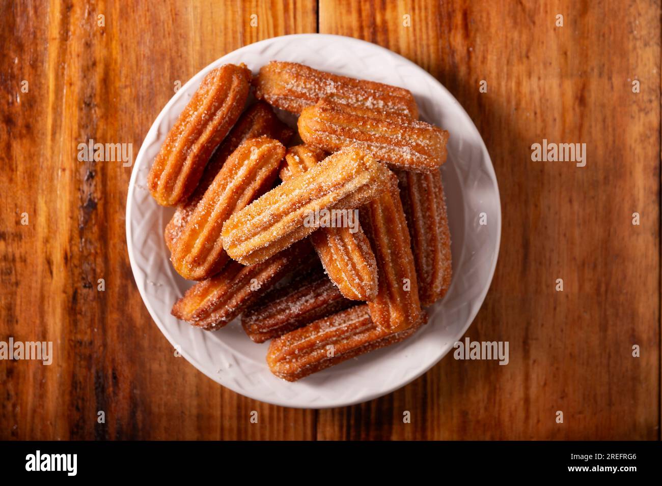 Churros. Fried wheat flour dough, a very popular sweet snack in Spain ...