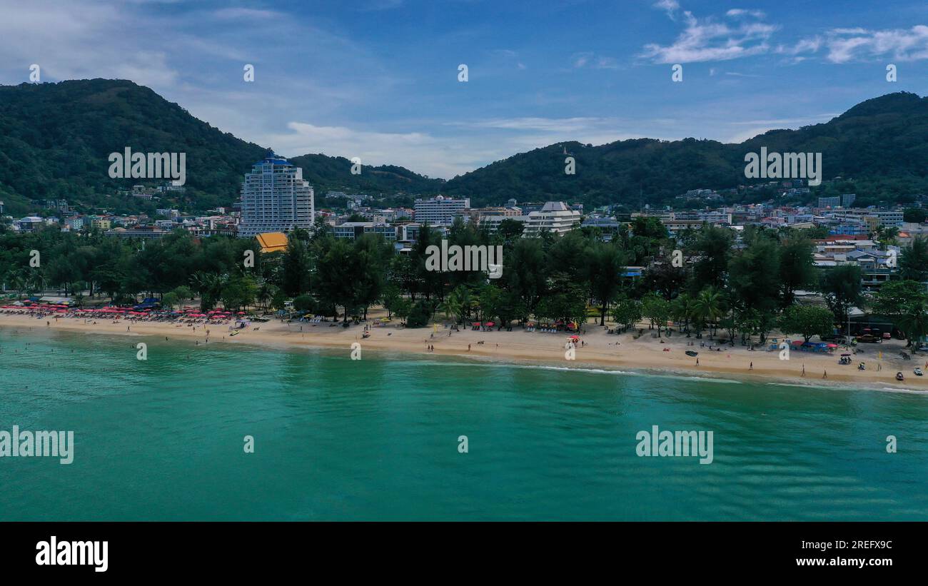 Aerial view of sea front hotels and apartments and tourists enjoying ...