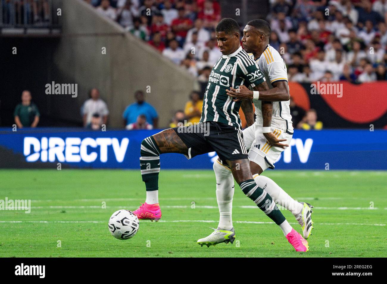 Manchester United forward Marcus Rashford (10) is defended by Real ...