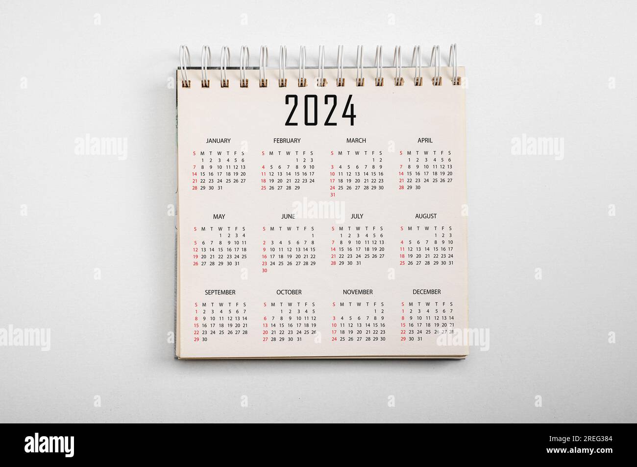 Calendar Year 2024 schedule. 2024 desk calender notepad on light gray ...