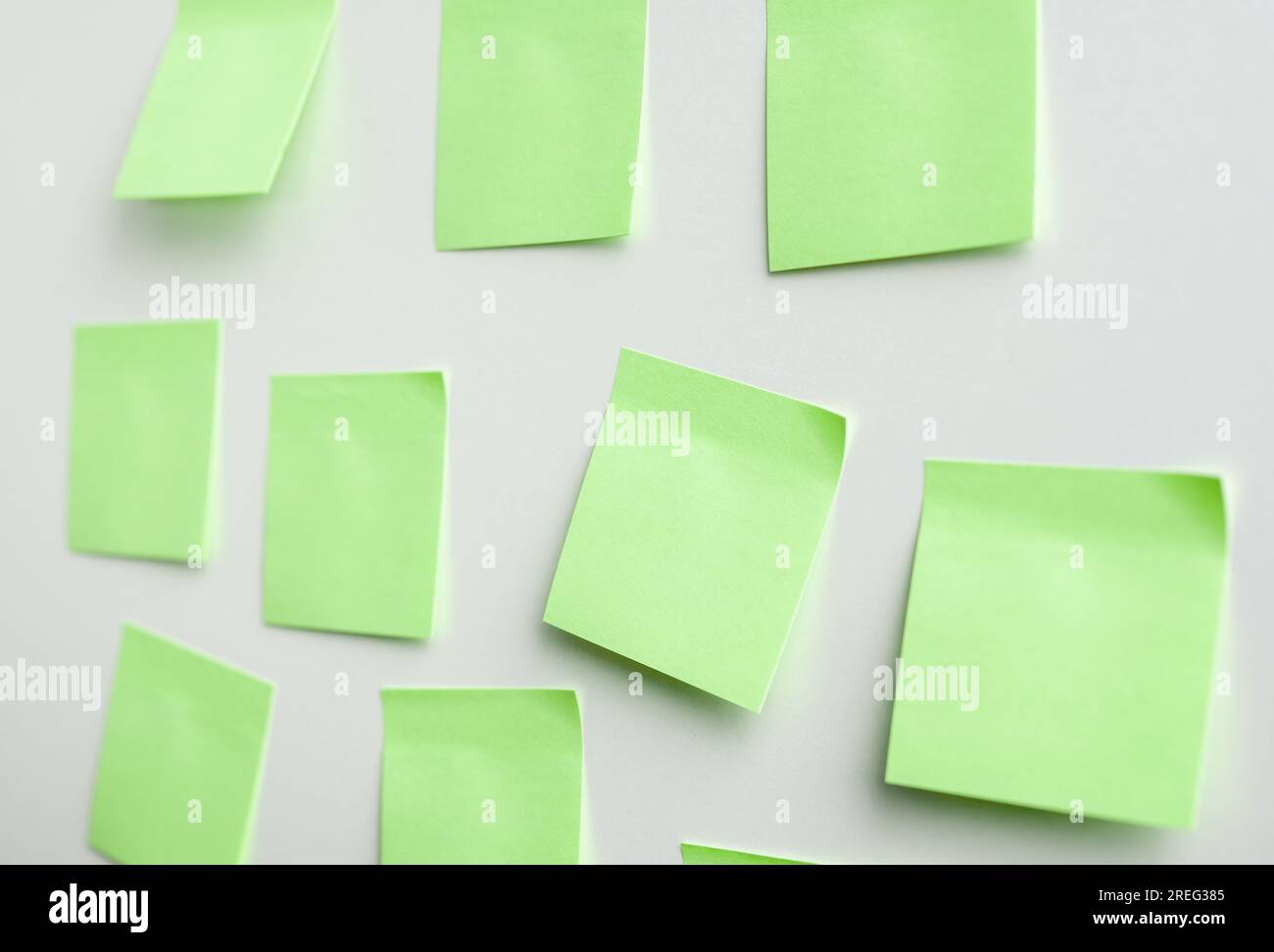 Set of blank green sticky notes. Business people meeting and use post ...