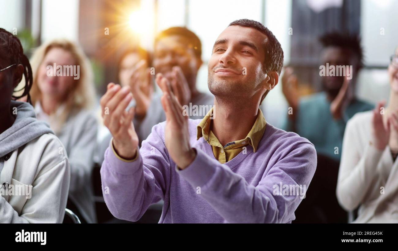 Seminar business meeting applause speaker. Crowded smiling audience ...