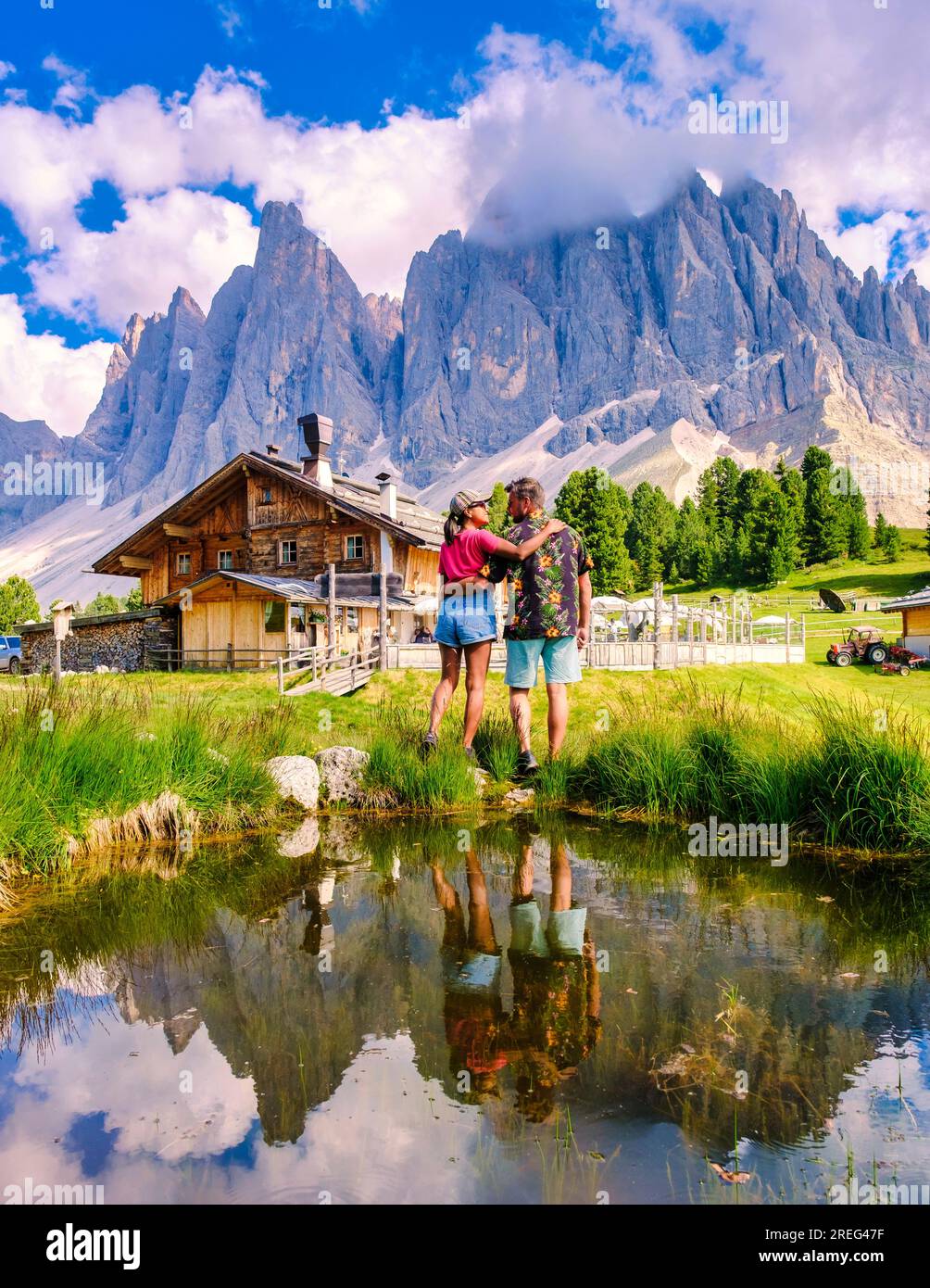 Couple men and women at Geisler Alm, Dolomites Italy, hiking in the ...
