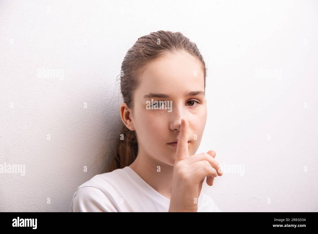 Shh Be Quiet Hush Please Teen Girl Presses Index Finger To Lips Makes Silence Hush Gesture
